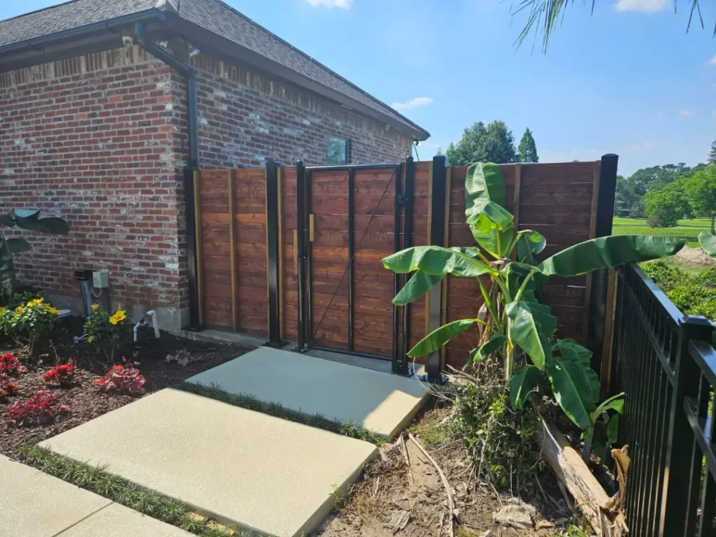 How Combination Metal and Wood Home Fences: Enhance Security and Aesthetics